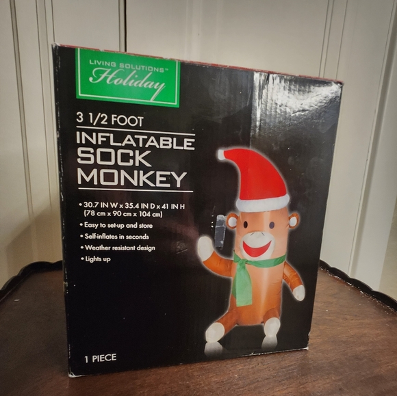 living solutions | Holiday | Inflatable Sock Monkey Christmas Santa Hat ...